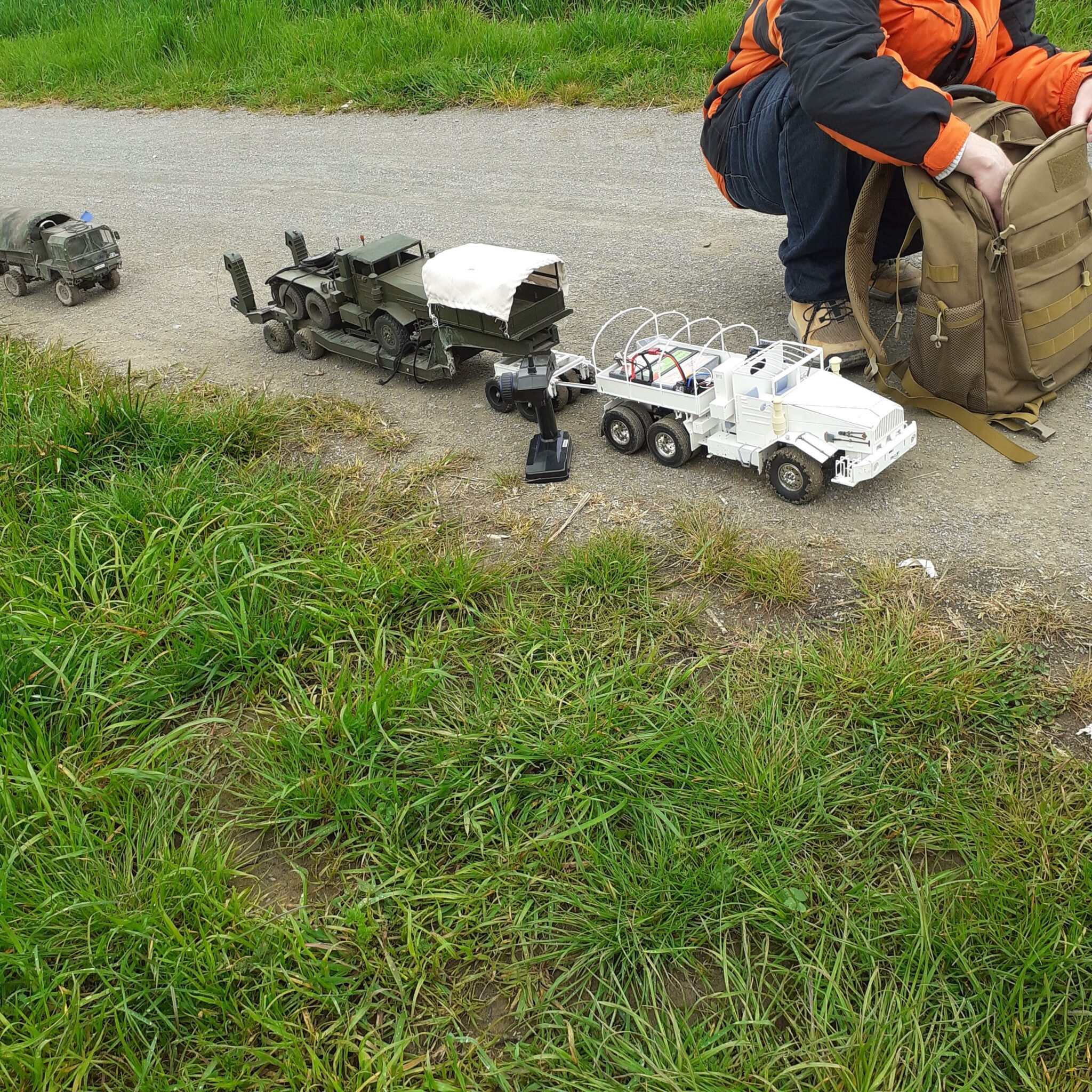 Modified trucks based on the Tamiya 1/14 RC trucks driving huge ...