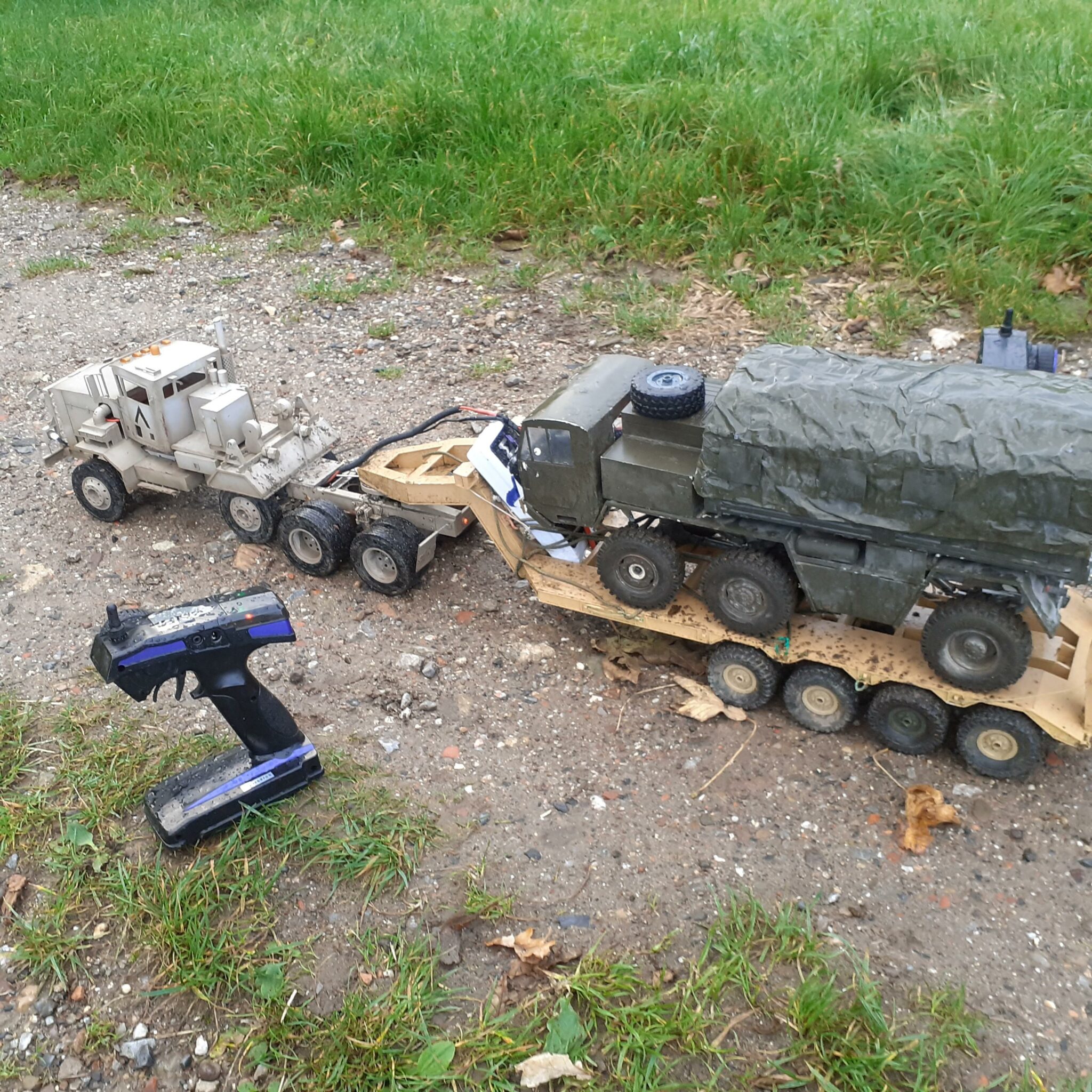 Modified trucks based on the Tamiya 1/14 RC trucks driving huge ...