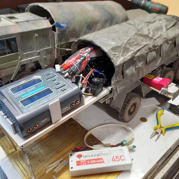 Modified trucks based on the Tamiya 1/14 RC trucks driving huge ...