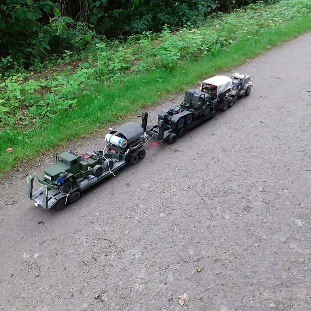 Modified trucks based on the Tamiya 1/14 RC trucks driving huge ...